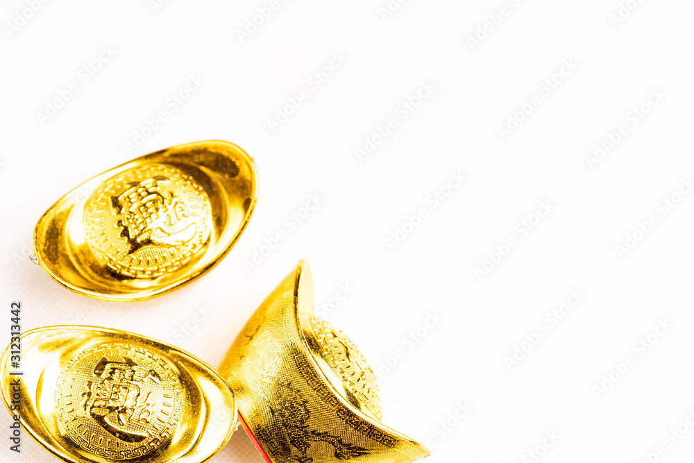 Chinese Gold Bar isolated against white. The words on the gold bar is ...