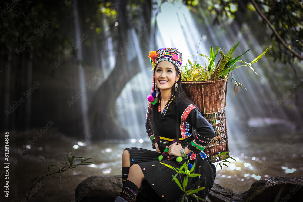 Beautiful Hmong girl lying on the edge of the stream Stock Photo ...