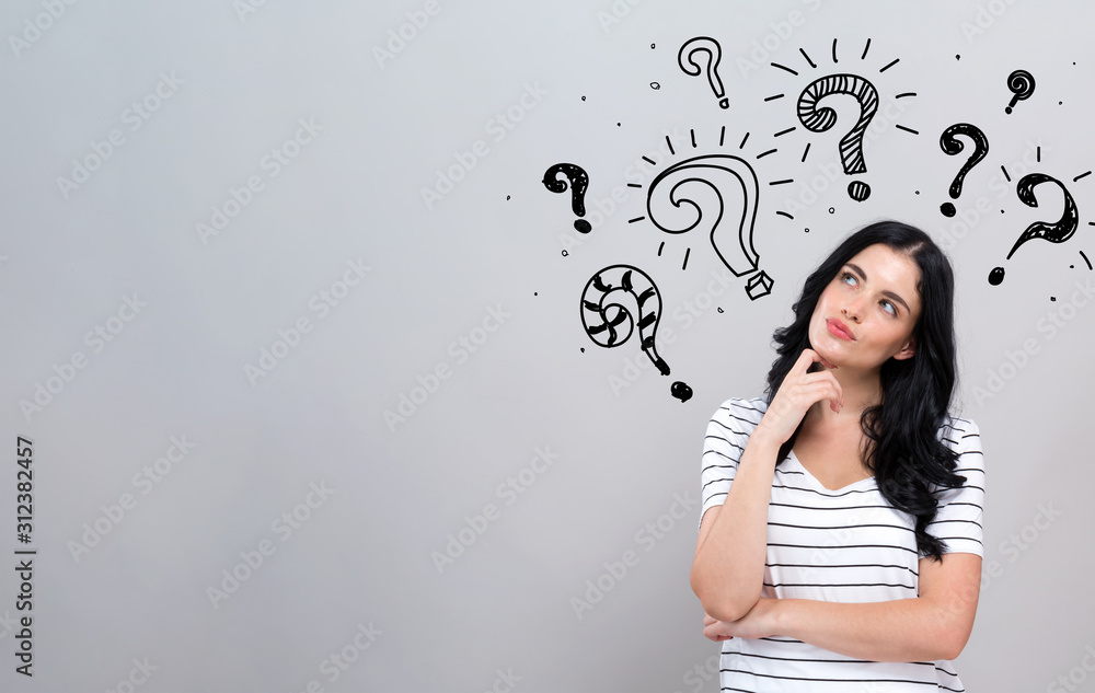 Question marks with young woman in a thoughtful face Stock Photo ...