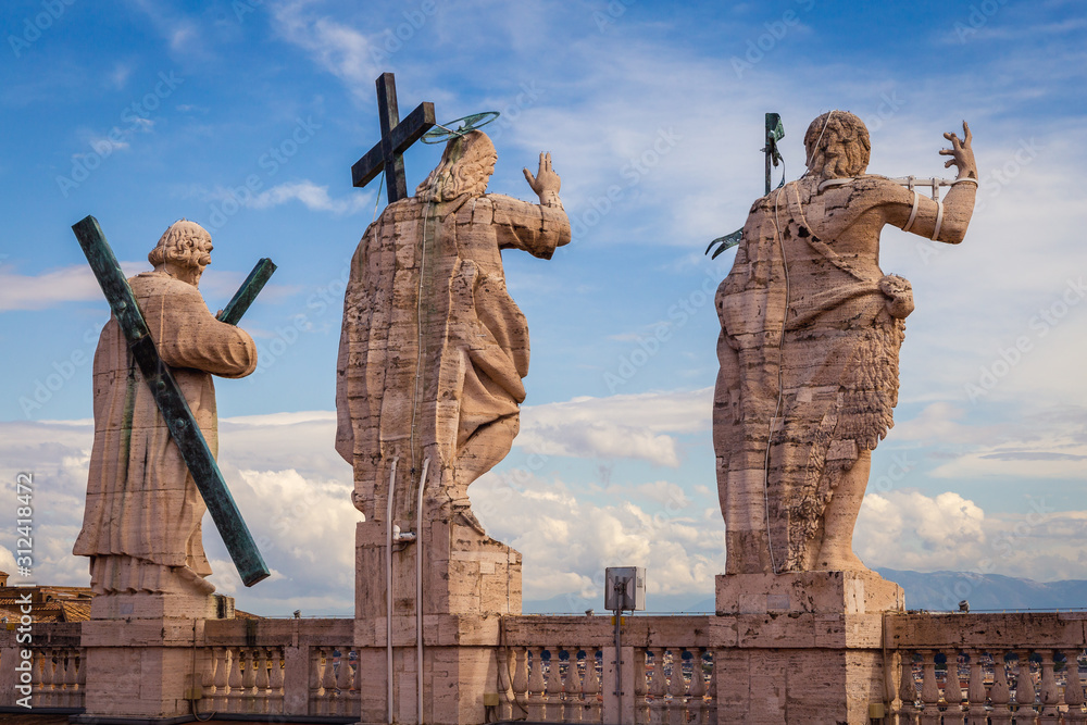 Statues of Jesus Christ, John the Baptist and apostles on the roof of ...