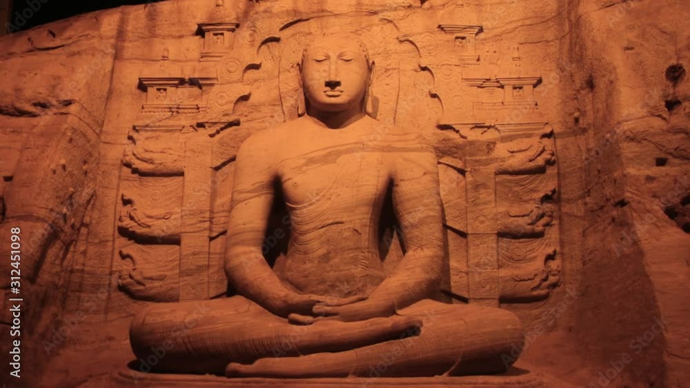 12th century Buddha statue at UNESCO world heritage site rock carving ...