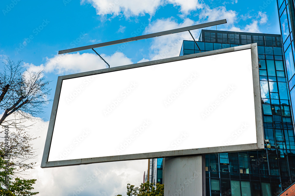 Advertising billboard mockup in front of modern office buildings Stock ...