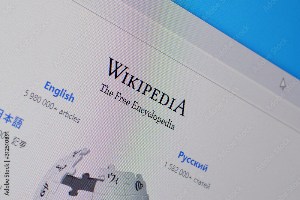 Homepage of wikipedia website on the display of PC, url - wikipedia.org ...