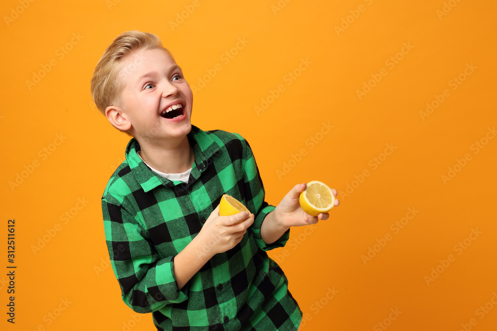 Happy child, facial expressions, energy and fun. The boy with a wide ...