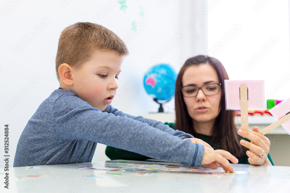 Children speech therapy concept. Preschooler practicing correct ...