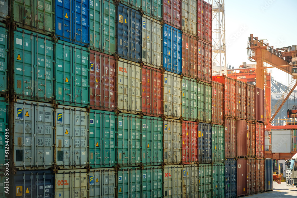 Stacked shipping container on freight harbour logistics centre inHong ...
