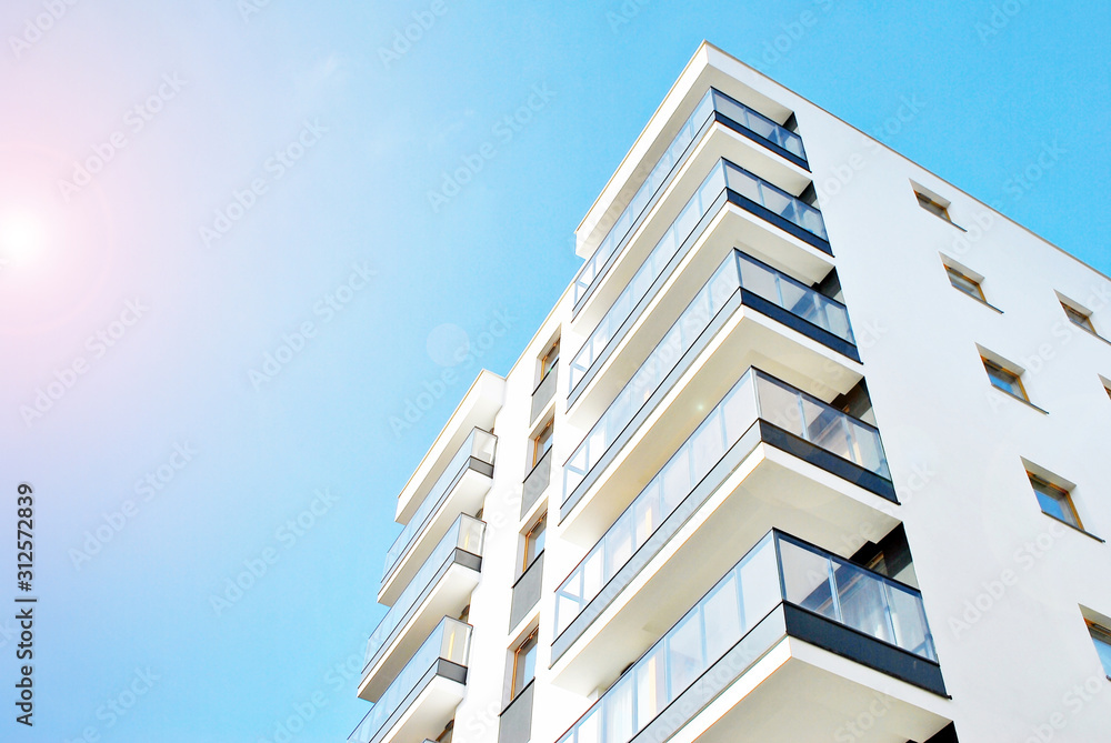 Sun rays light effects on urban buildings. Fragment of modern ...