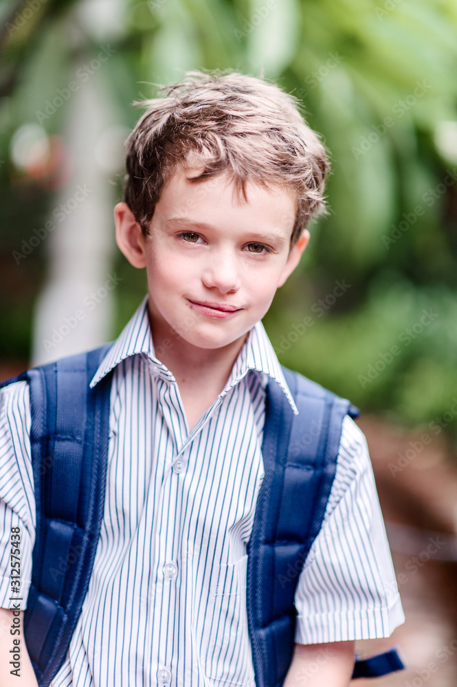 Young boy in a new school uniform on the first day of school Stock ...