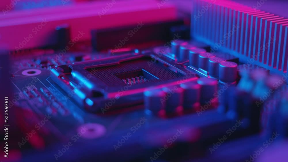 Shot with colorful light macro electronic part of a computer ...