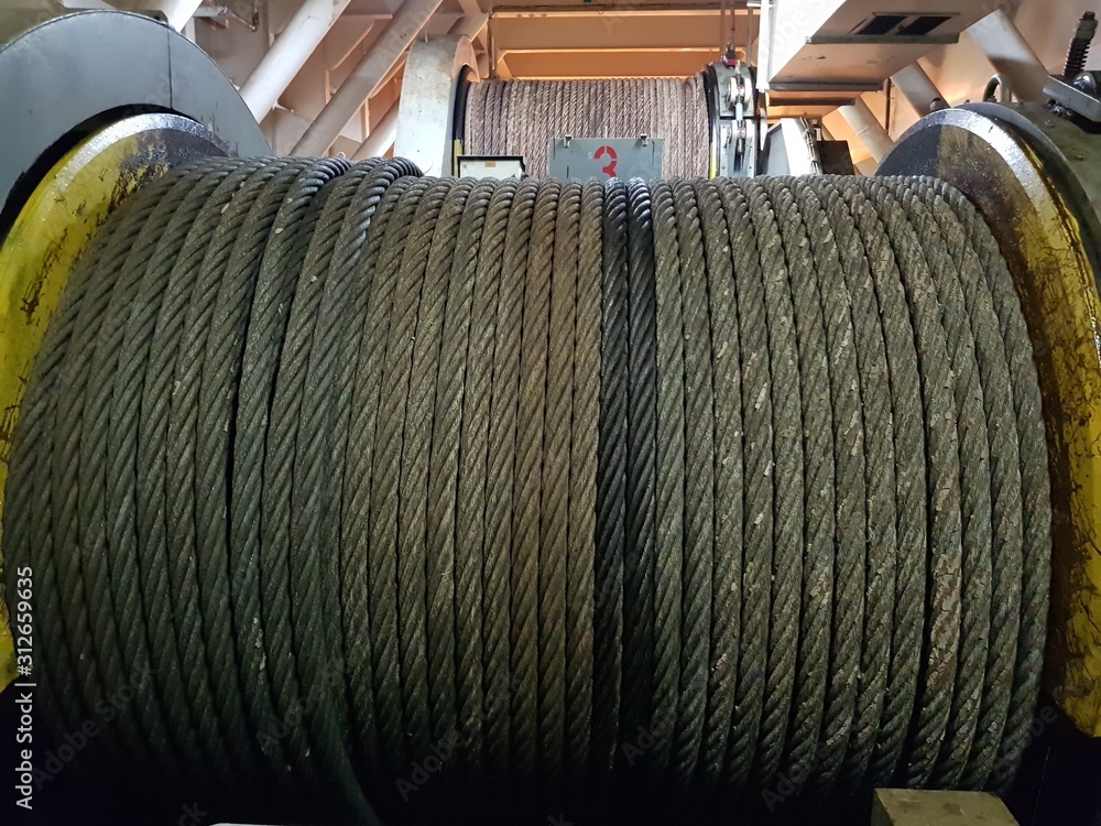 Wire rope inside a drum of a winch on board a construction work vessel ...