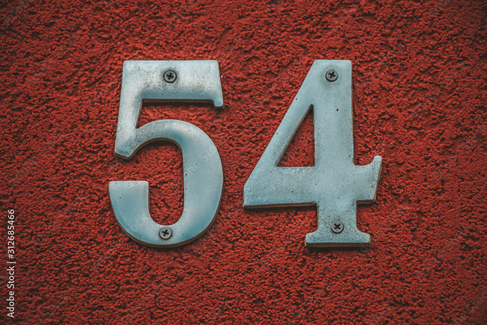 Vintage door numbers in old street Stock Photo | Adobe Stock