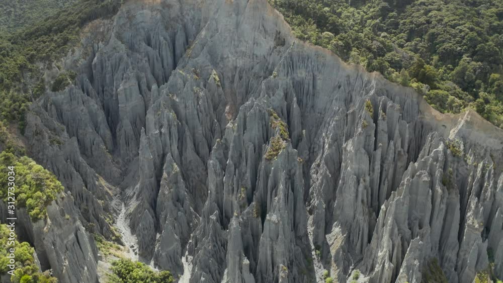 Approaching of putangirua pinnacles pointed mounted tops surrounded by ...