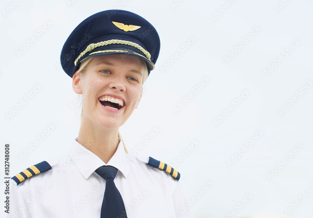 happy female pilot laughing in uniform. Professional pilot woman ...