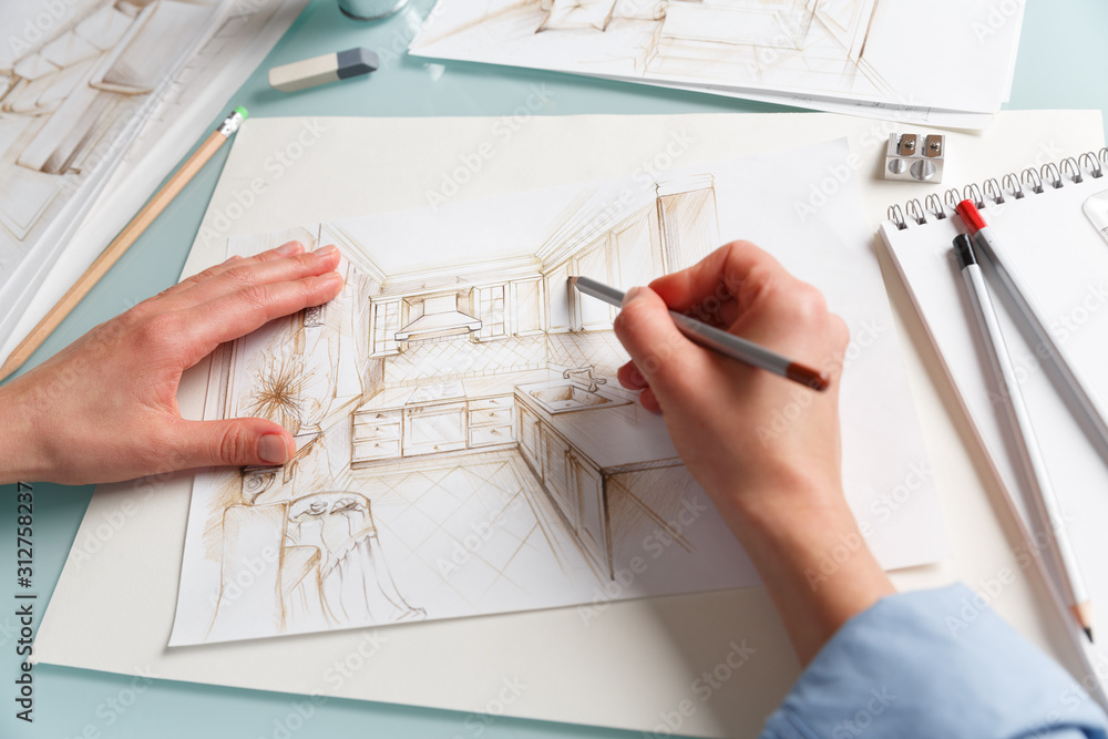 Interior designer drawing pencil sketch of a kitchen Stock Photo ...