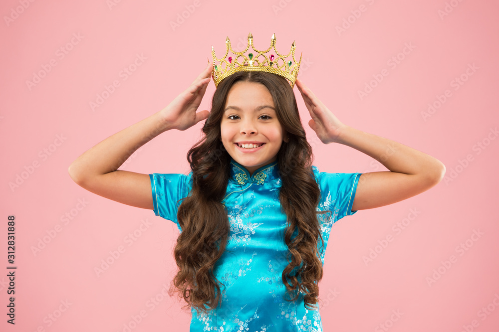 pageant queen. happy kid chinese dress wear crown. portrait of pride ...
