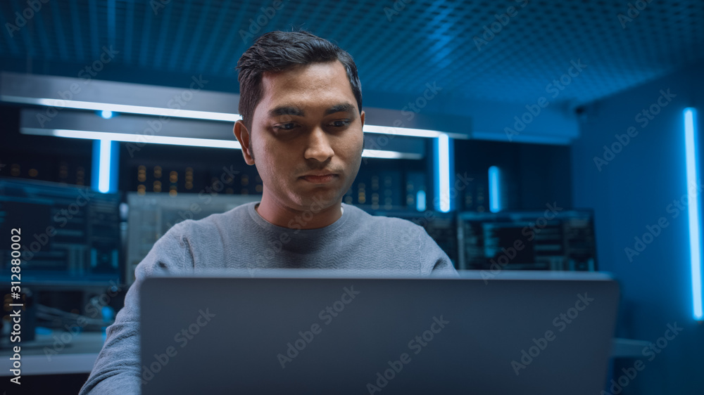 Portrait of Software Programmer Sitting at His Desk and Working on ...