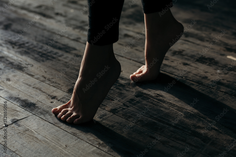 Female feet walking on warm heated floor close up view, barefoot girl ...