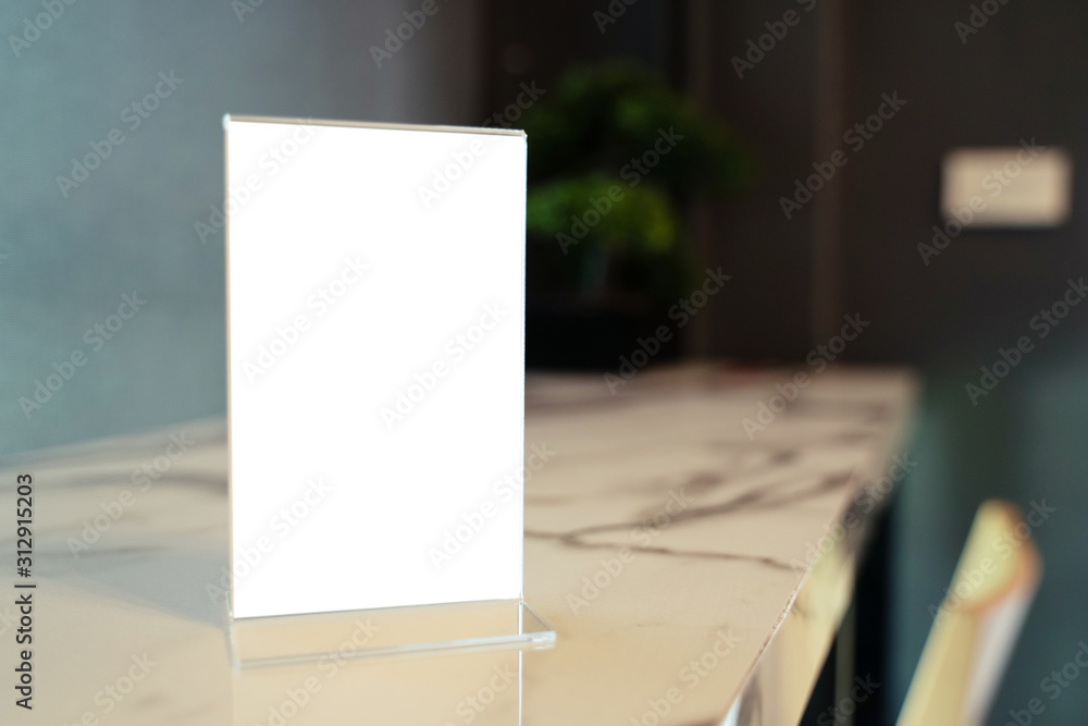 Mock up Menu frame standing on wood table in Bar restaurant cafe. space ...