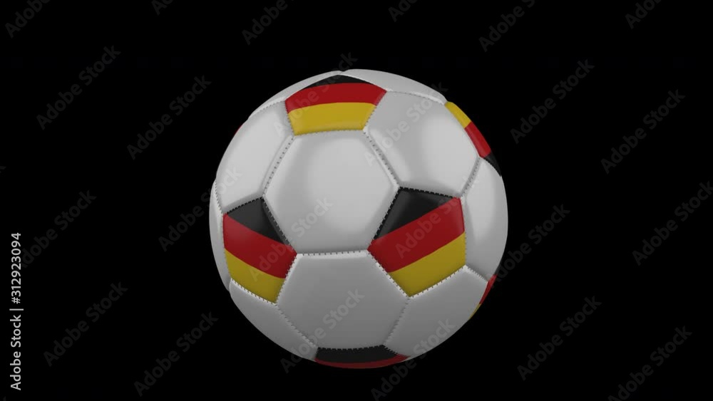 Germany flag on a flying and rotating soccer ball on a transparent ...