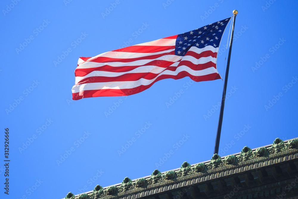 American flag on building as symbol of democracy Stock Photo | Adobe Stock