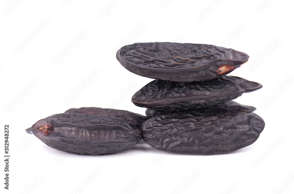 Tonka beans isolated on white background. Bean of Dipteryx odorata ...