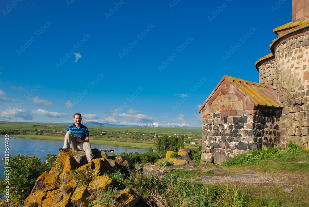 Beautiful view of Sevan lake with turquoise water and green hills, Sevan, Armenia. nature of ...