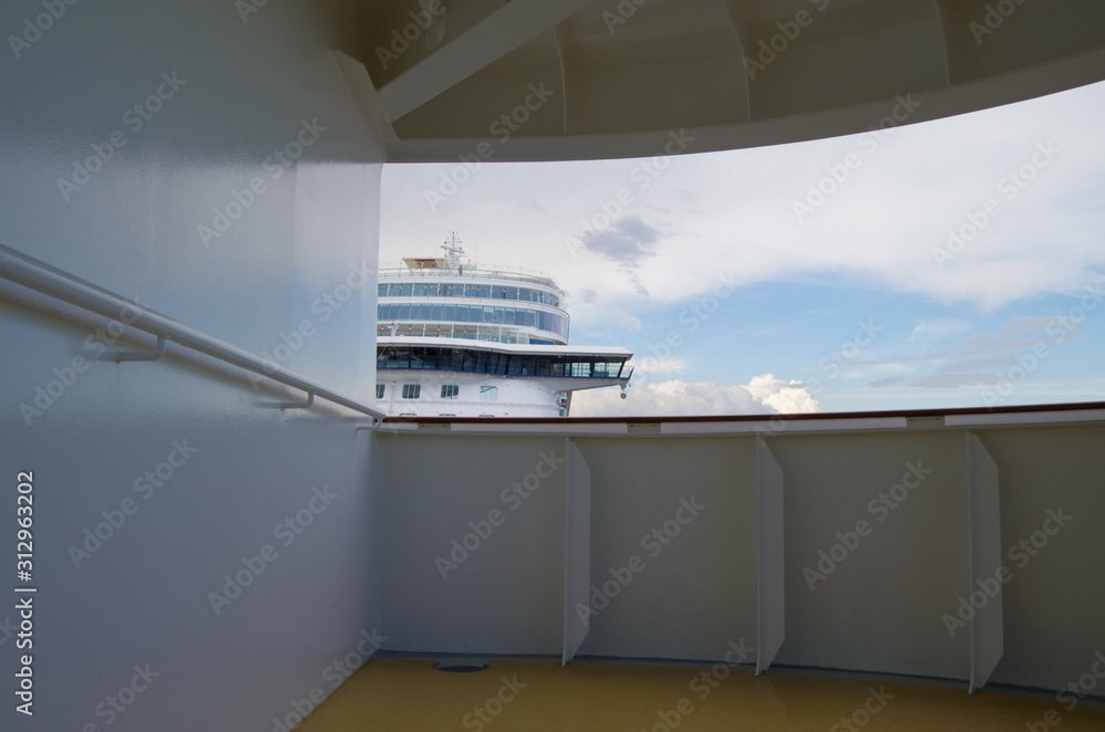 Bridge and superstructure of modern cruise ship liner in window frame ...