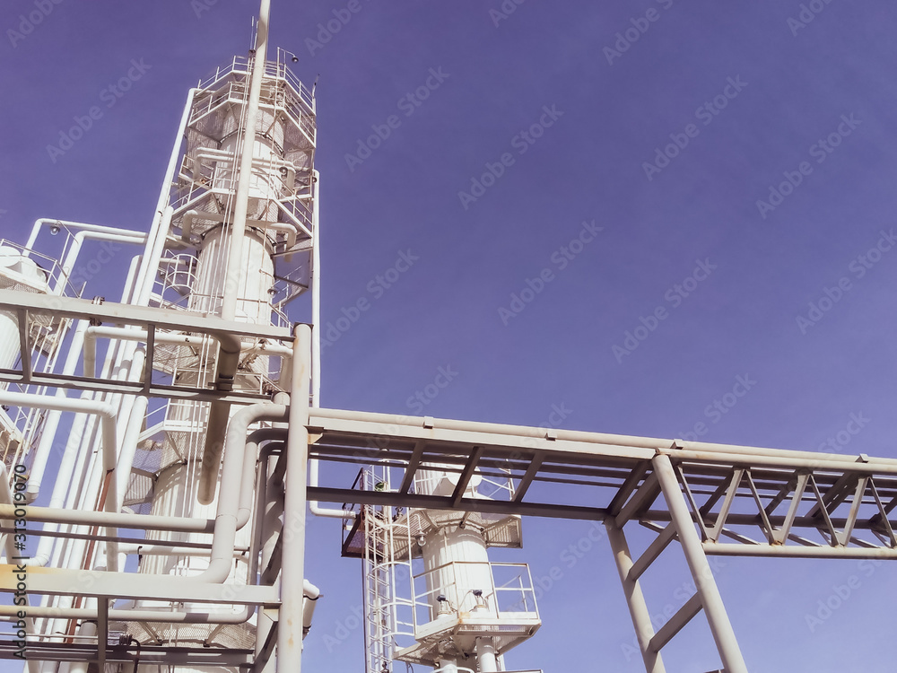 Distillation columns and heating furnace Stock Photo | Adobe Stock