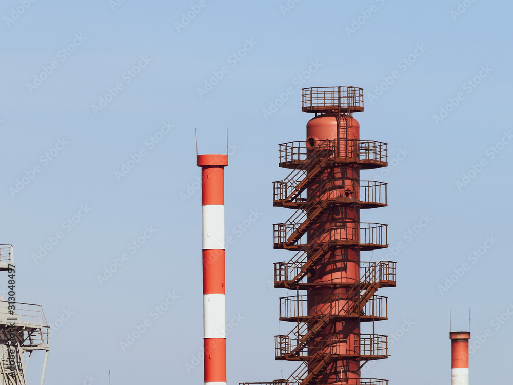 Pipes refinery furnaces and distillation column Stock Photo | Adobe Stock