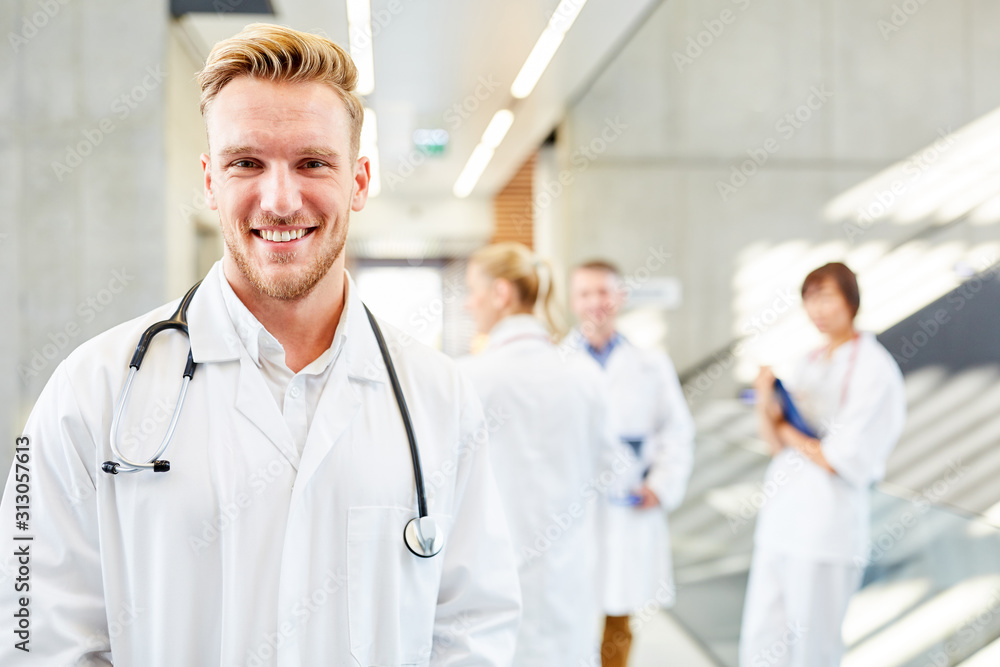 Young man as a successful medical assistant Stock Photo | Adobe Stock