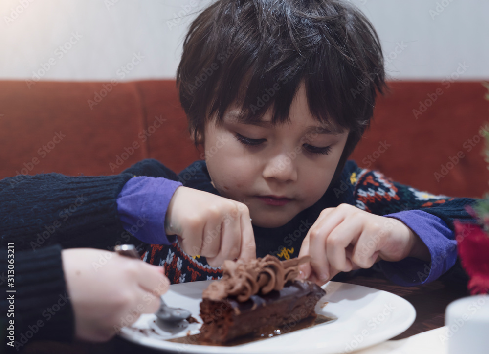 Kid Eating Chocolate Cake