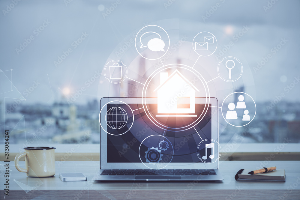 Desktop computer background in office and big town buildings hologram ...