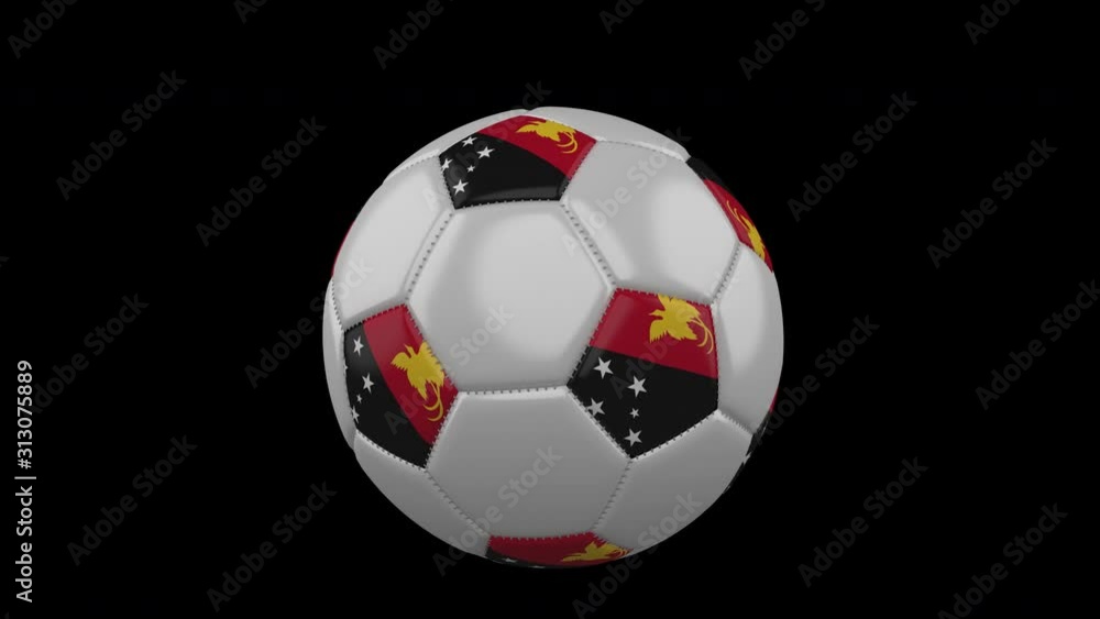 Papua New Guinea flag on a flying and rotating soccer ball on a ...