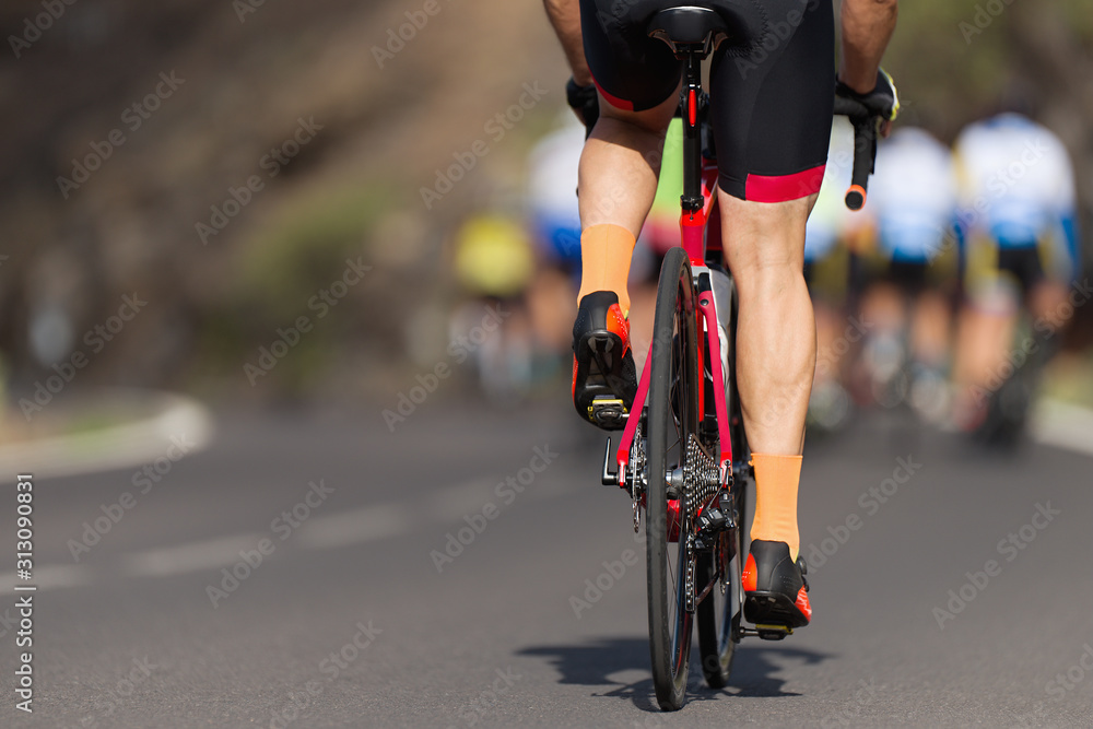 Cycling competition cyclist athletes riding a race at high speed ...