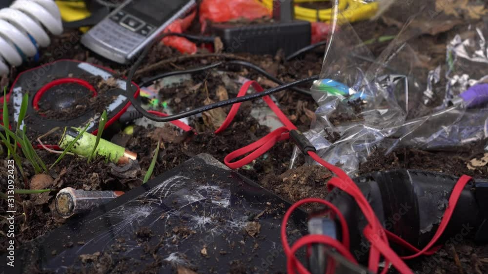 Vídeo do Stock: Used electronics in a landfill. Waste Electrical and ...