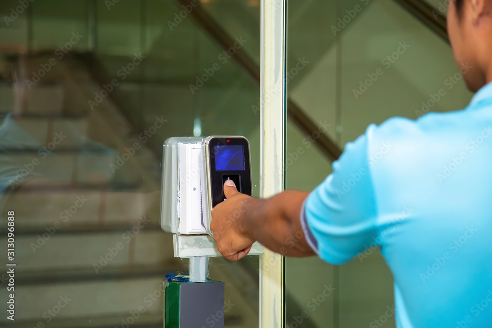 The hand are scanning on fingerprint machine for enter digital security ...