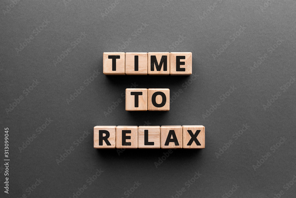 Time to relax - word from wooden blocks with letters, stop being angry ...