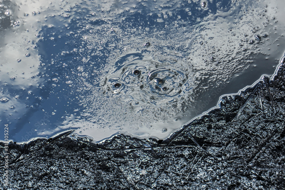 Abstract background. Spills of crude oil on the soil surface ...