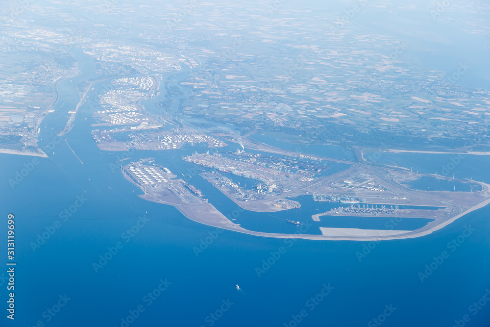 aerial view from window of an airplane looking over the Rotterdam port ...