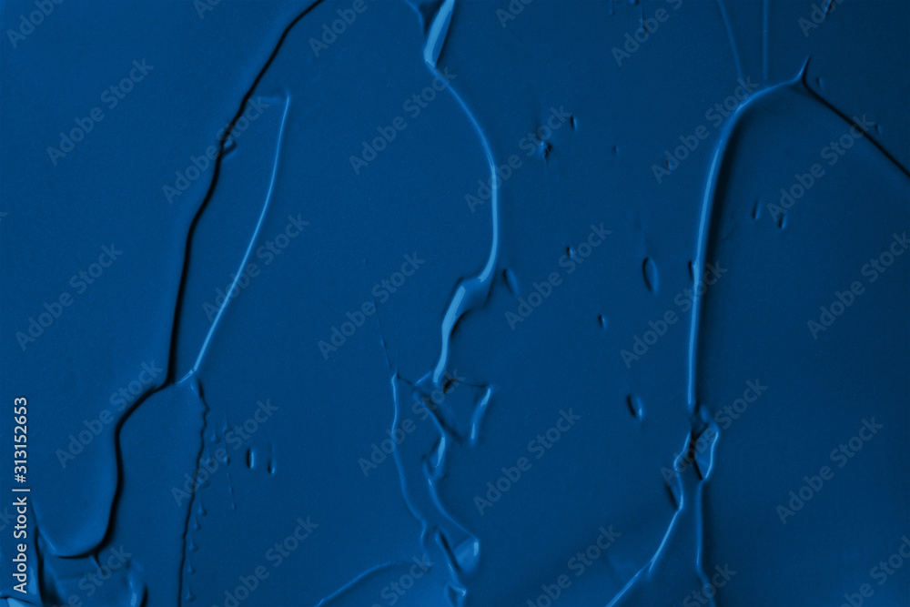 A liquid creamy texture of cosmetic products or acrylic paint smear of ...