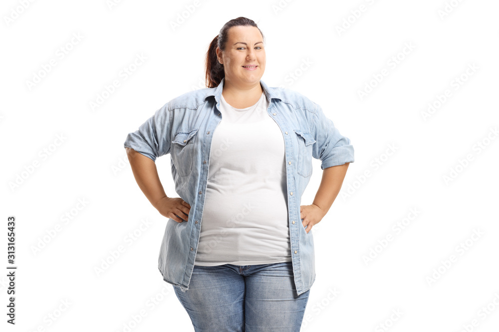 Corpulent casual woman standing with hands on her waist Stock Photo ...