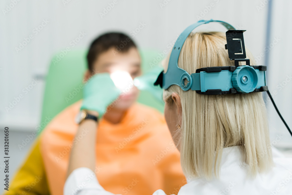 Fotka „Preventive inspection of a teenage boy in a medical facility ...