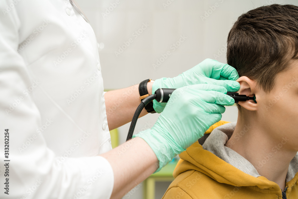 Preventive inspection of a teenage boy in a medical facility ...