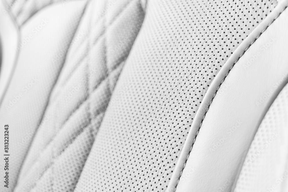 Modern luxury Car white leather interior. Part of perforated leather ...