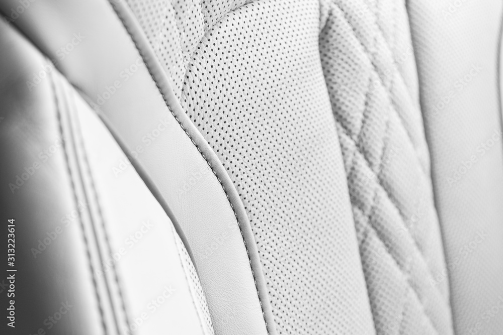 Modern luxury Car white leather interior. Part of perforated leather ...