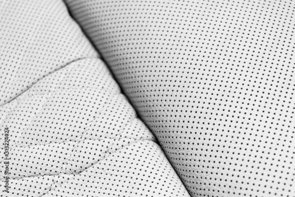 Modern luxury Car white leather interior. Part of perforated leather ...