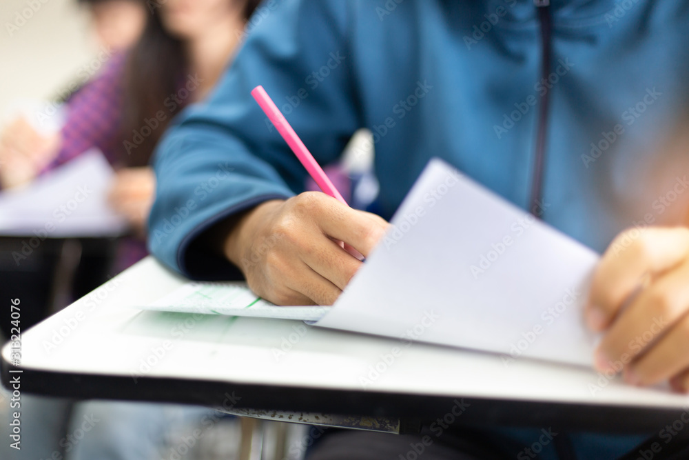 high school,university student study.hands holding pencil writing paper ...