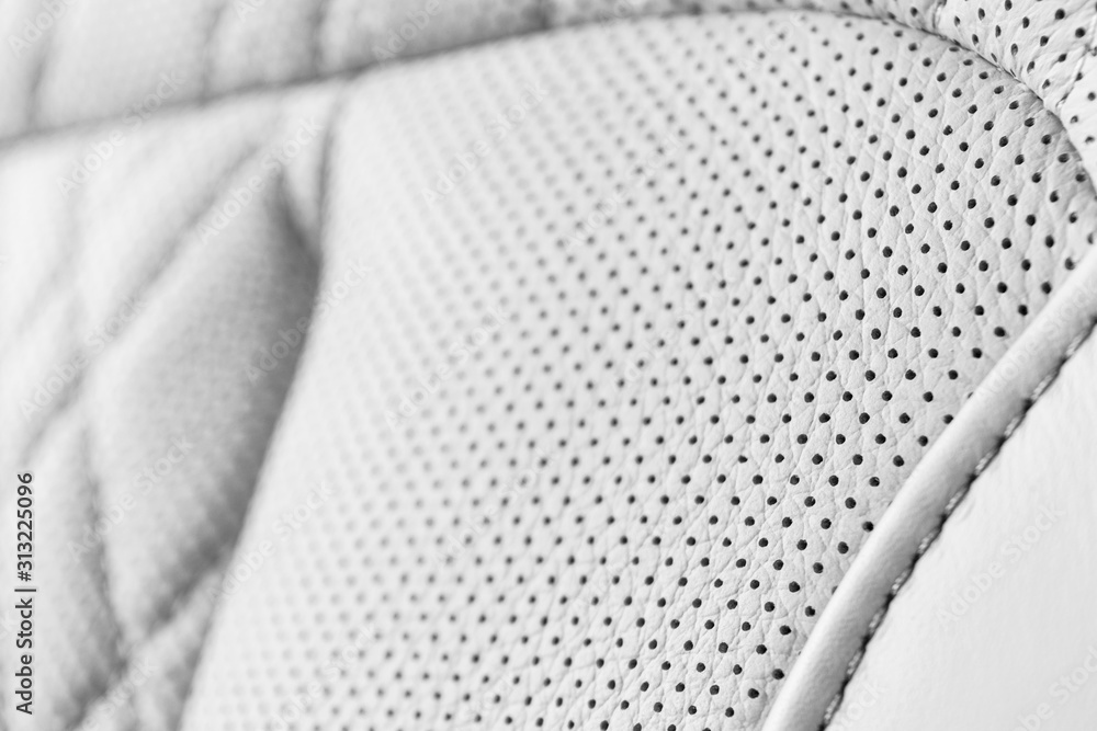Modern luxury Car white leather interior. Part of perforated leather ...