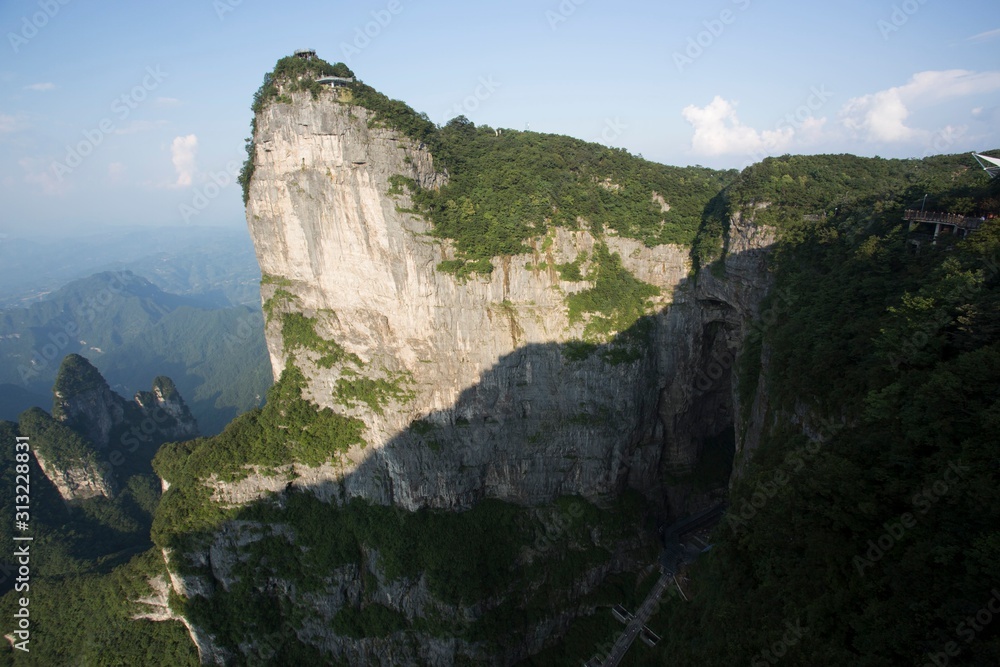 Tianmen Mountain Known as The Heaven`s Gate surrounded by the green ...