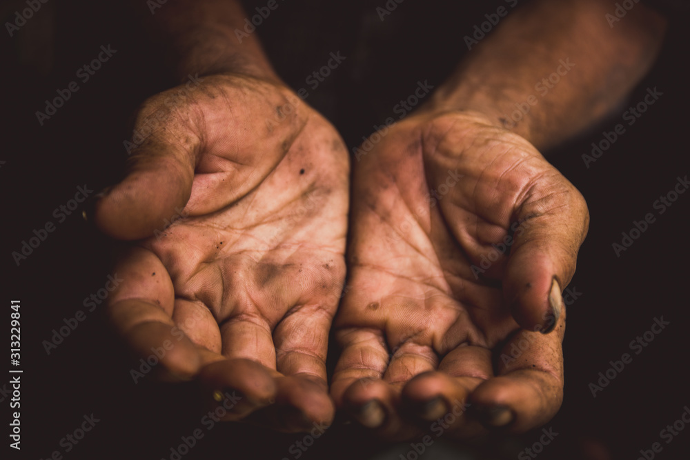 hands poor man or beggar begging you for help sitting at dirty slum ...